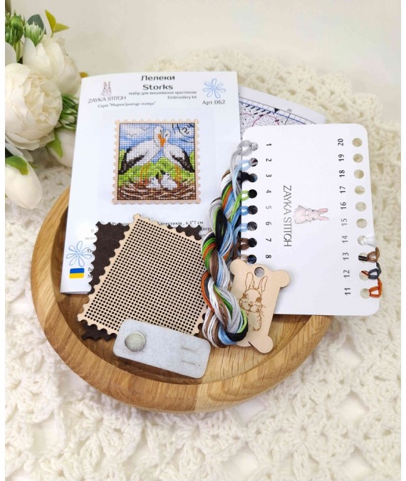 Cross-stitch kit “Storks” — birds, nest, blue sky, wooden base, DMC