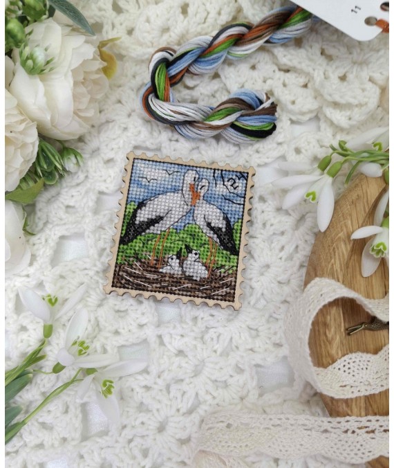 Cross-stitch kit “Storks” — birds, nest, blue sky, wooden base, DMC